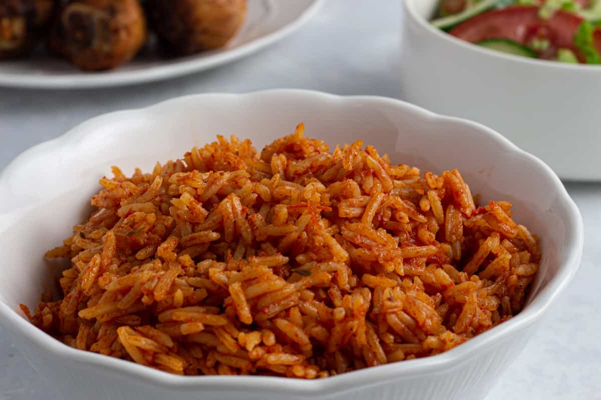 Jollof Rice, 2 Ways - Nigerian & Ghanaian · eat well abi